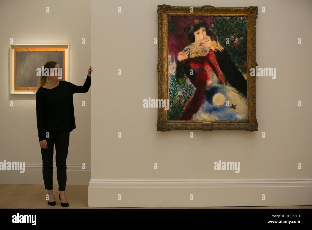 London, UK. 6th Oct, 2017. A Sotheby's staff looks at Marc Chagall, Les ...