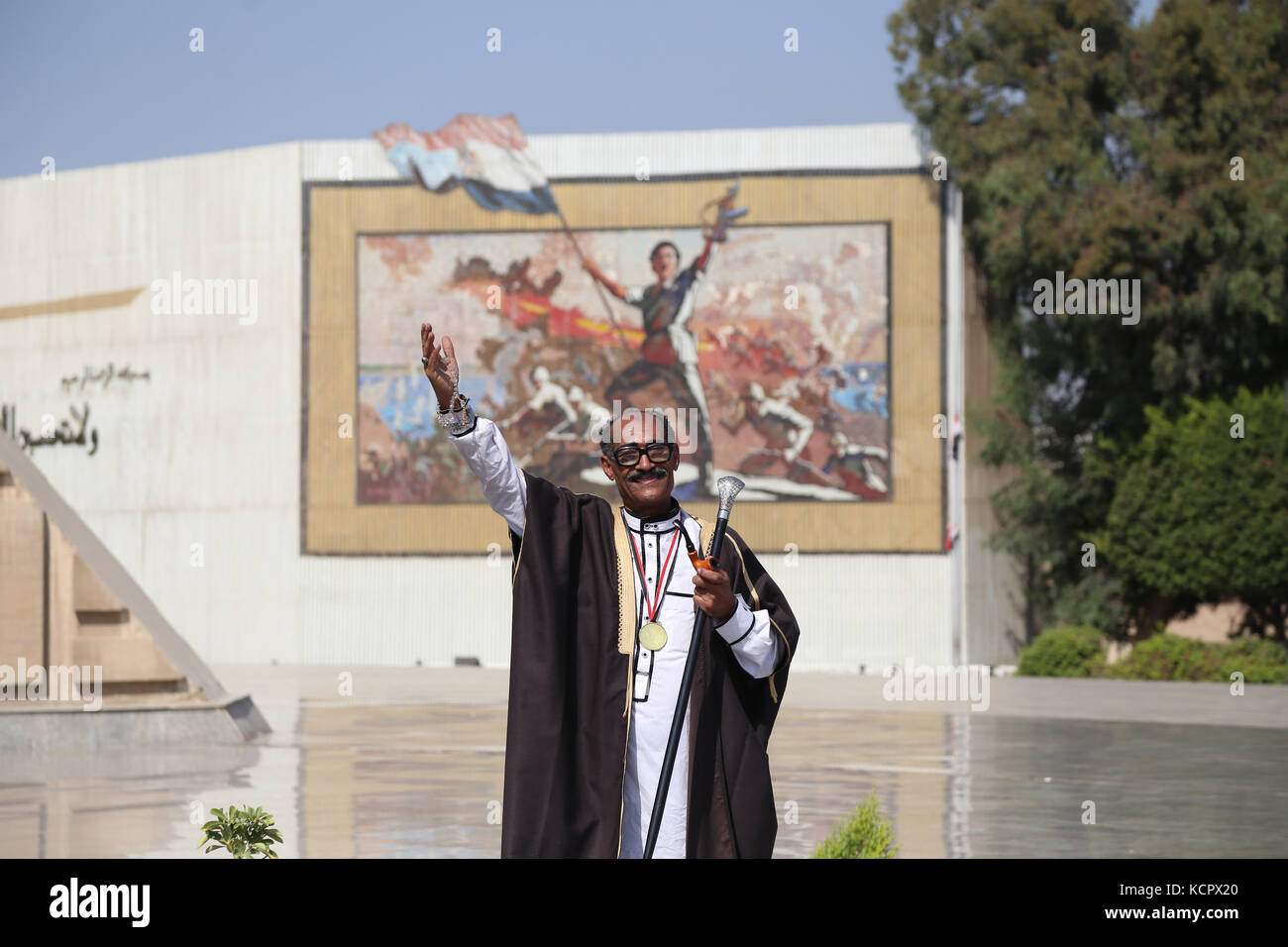 Cairo, Egypt. 6th Oct, 2017. A man poses for a photo at the Sadat ...