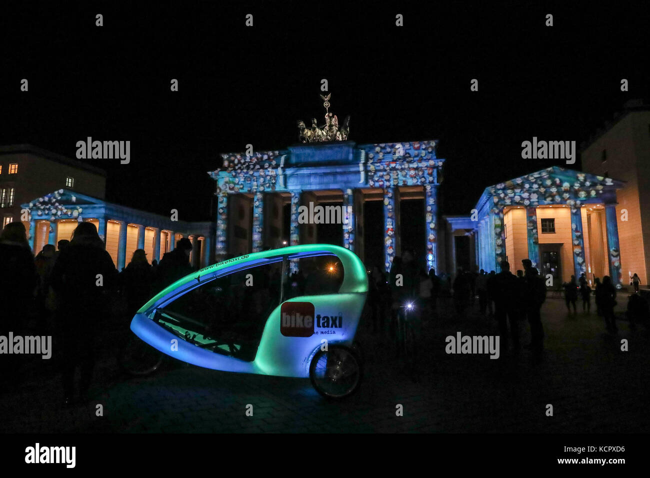Berlin, Germany. 6th Oct, 2017. A tricycle with lights is seen in front ...