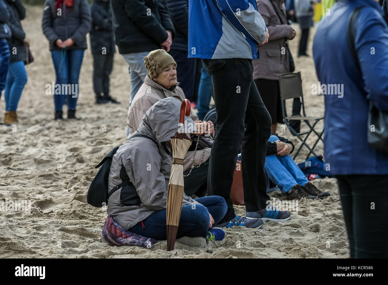 Lady praying poland hi-res stock photography and images - Alamy