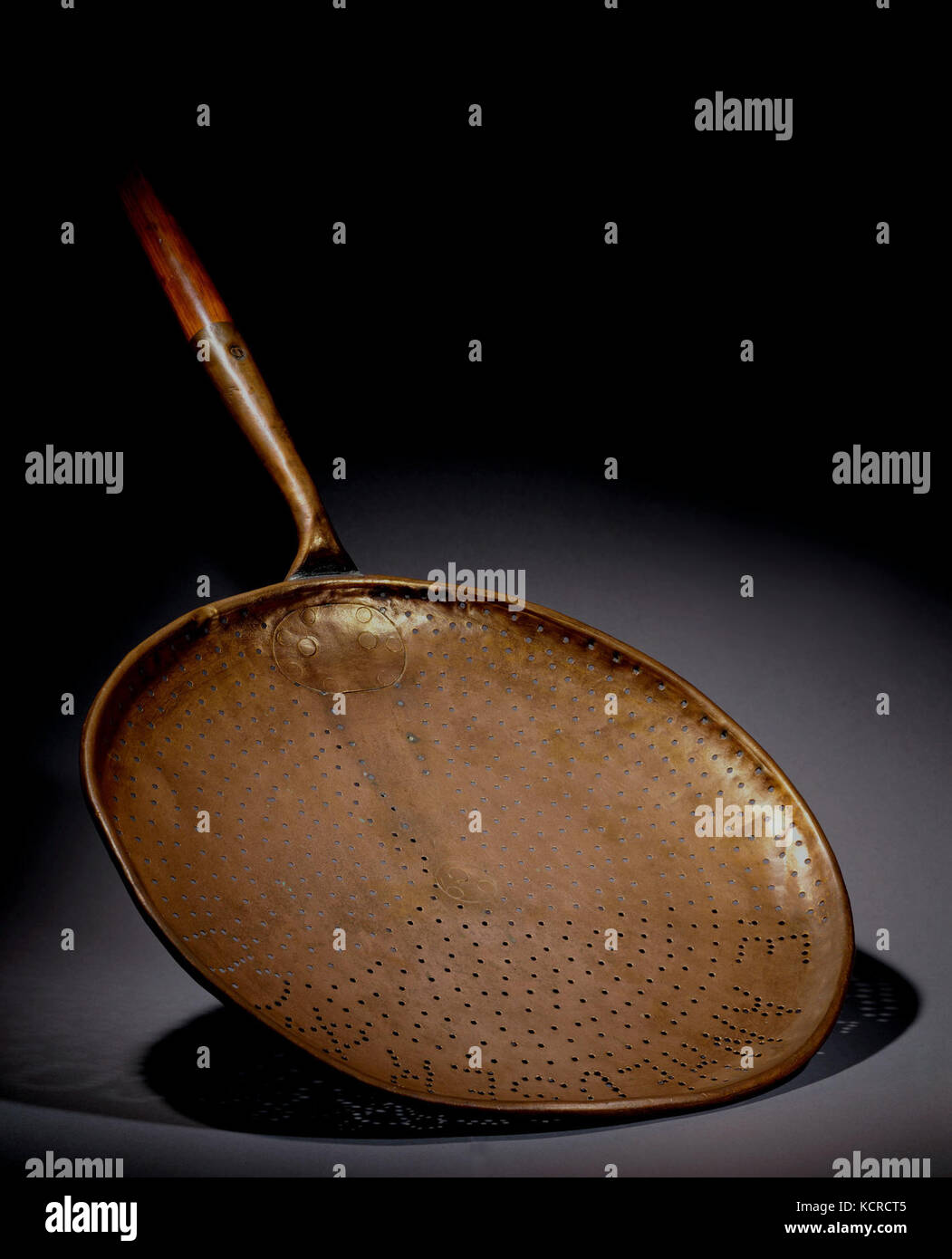 E. Anheuser and Co. Copper Beer Skimmer Stock Photo - Alamy