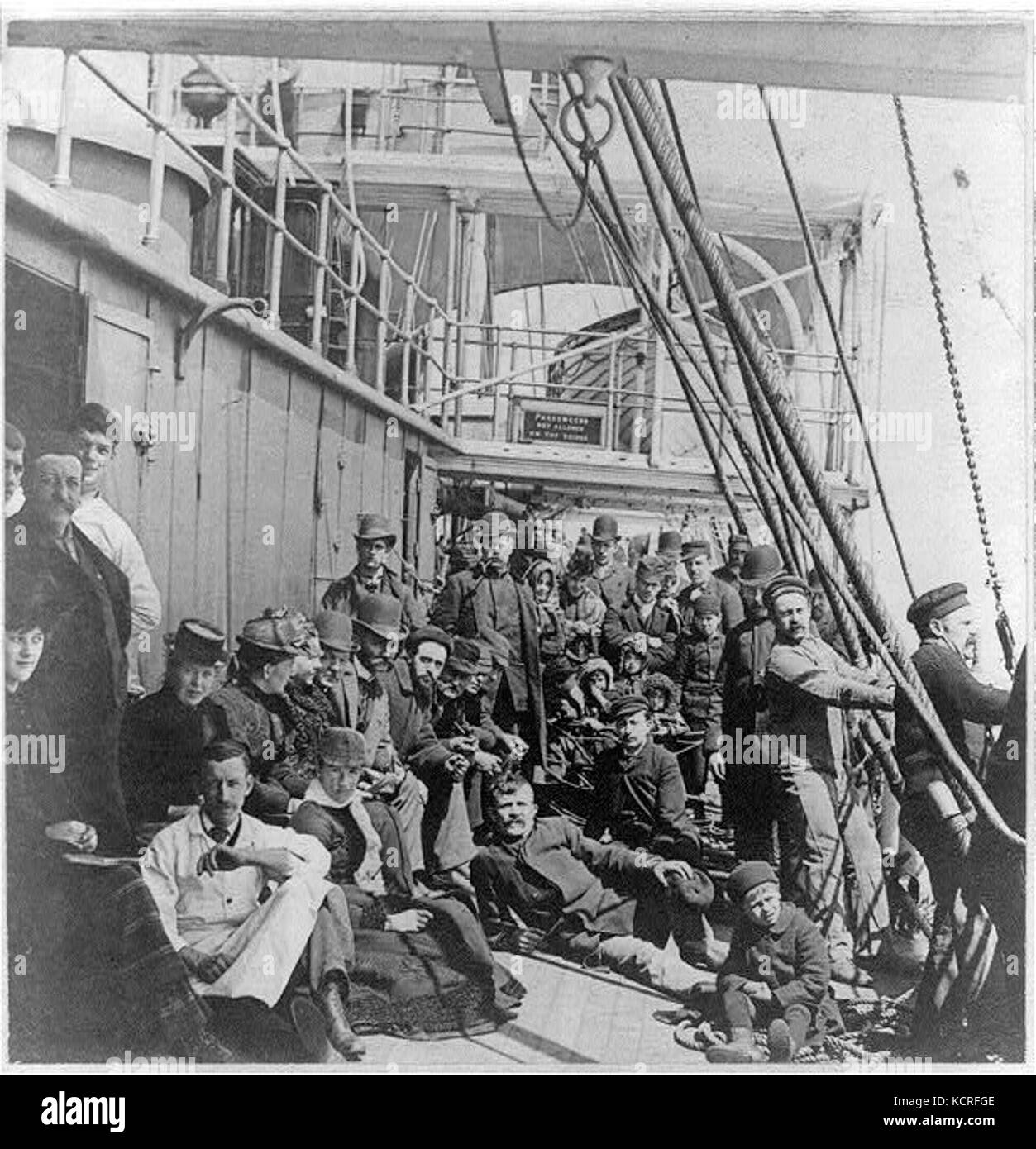 Emigrants on the crowded lower deck of a ship, in mid ocean Stock Photo ...