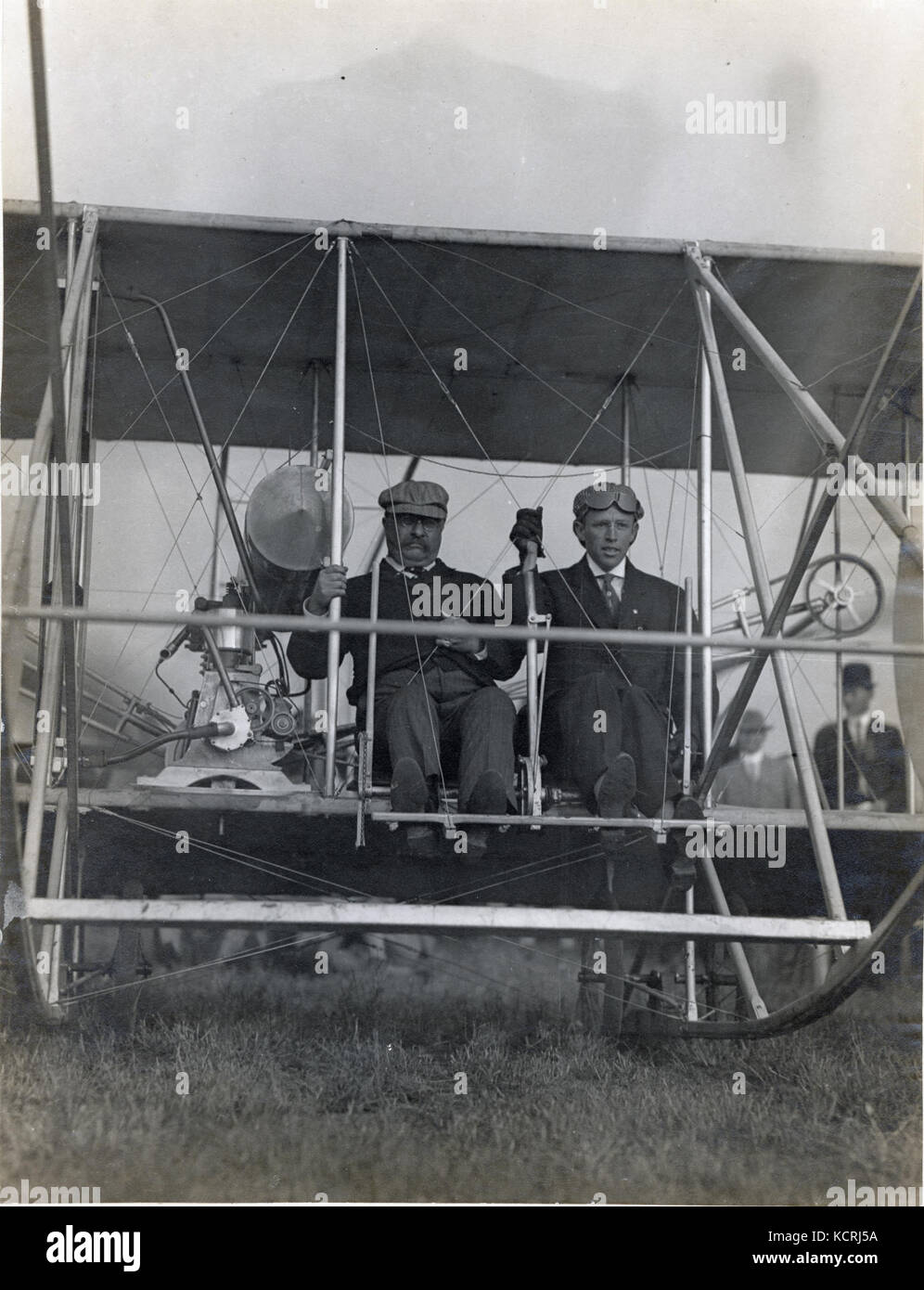 Former President Theodore Roosevelt and pilot Arch Hoxsey preparing for ...