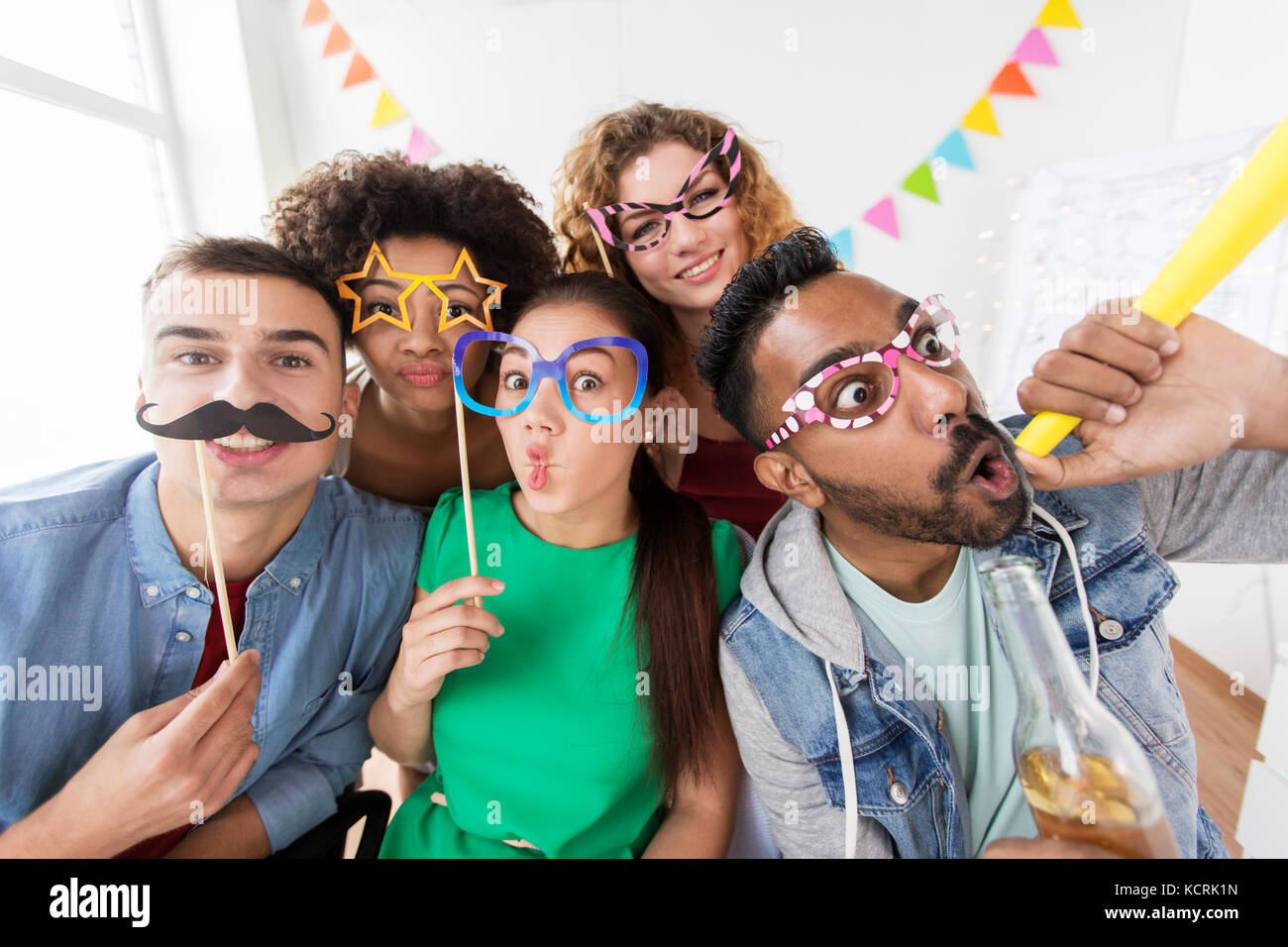 happy friends or team having fun at office party Stock Photo - Alamy