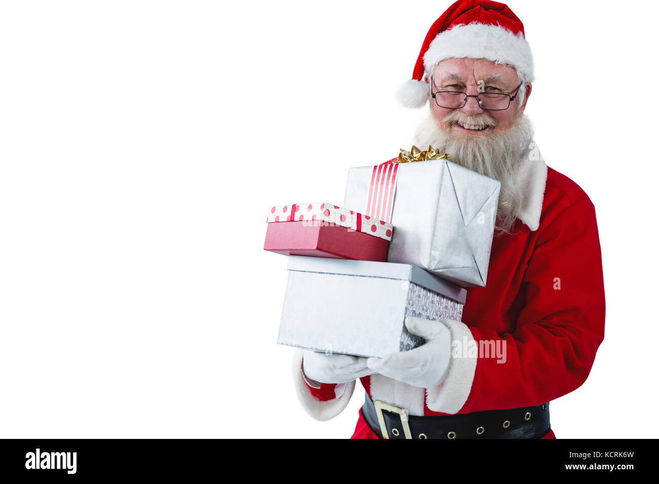 Santa Claus holding gift boxes against white background Stock Photo - Alamy