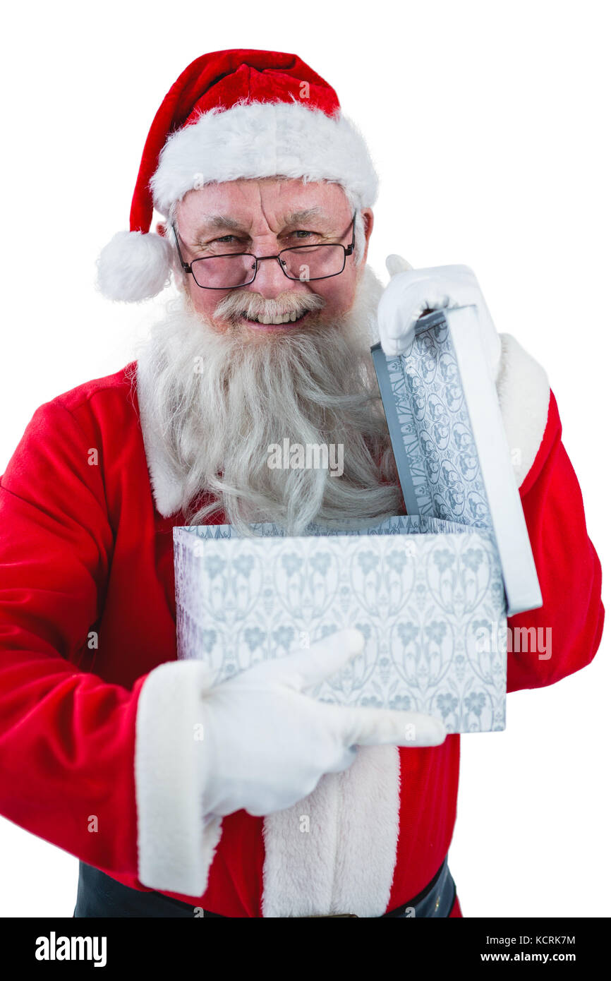 Santa Claus opening a gift box against white background Stock Photo - Alamy