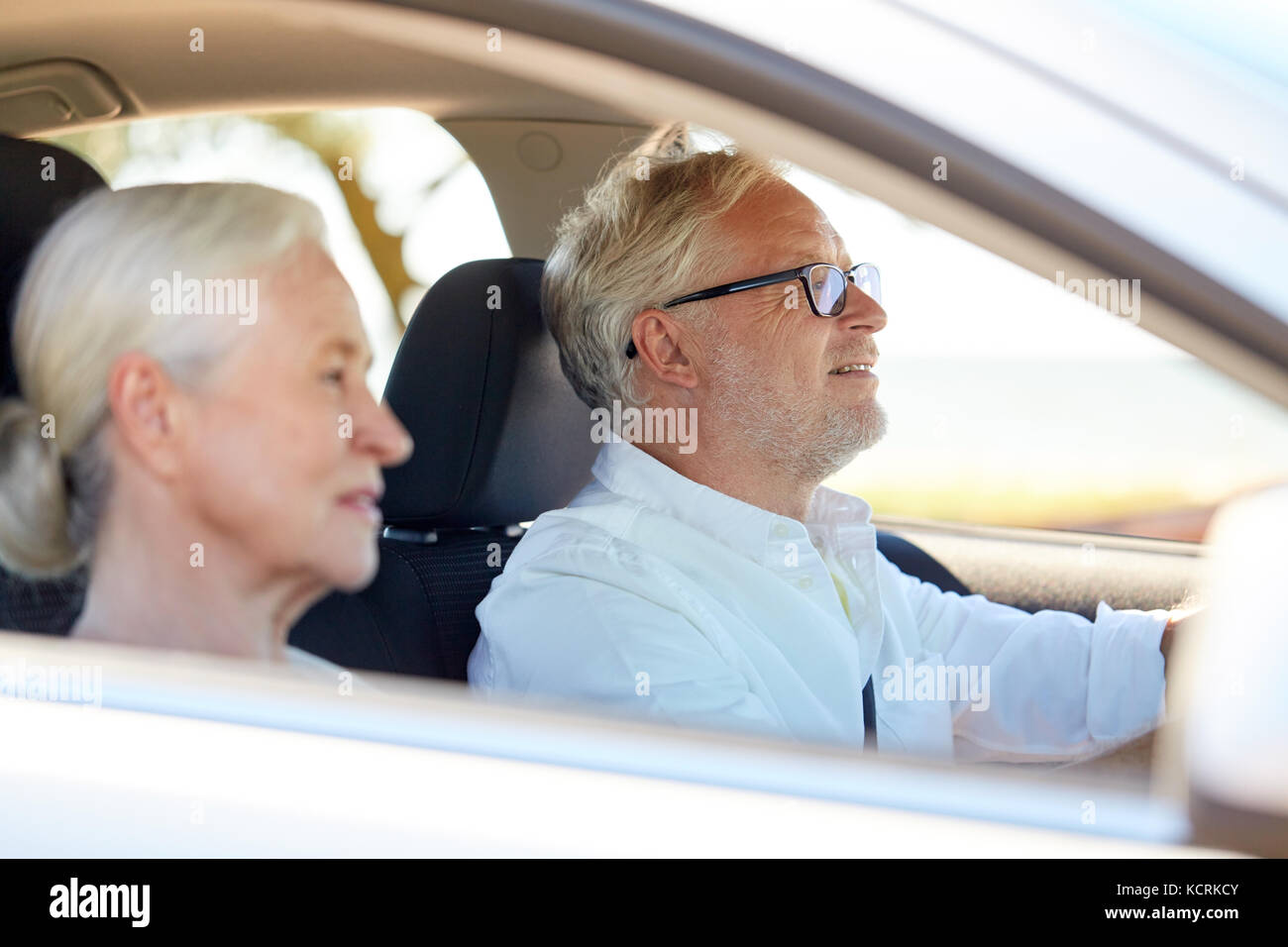 happy senior couple driving in car Stock Photo - Alamy