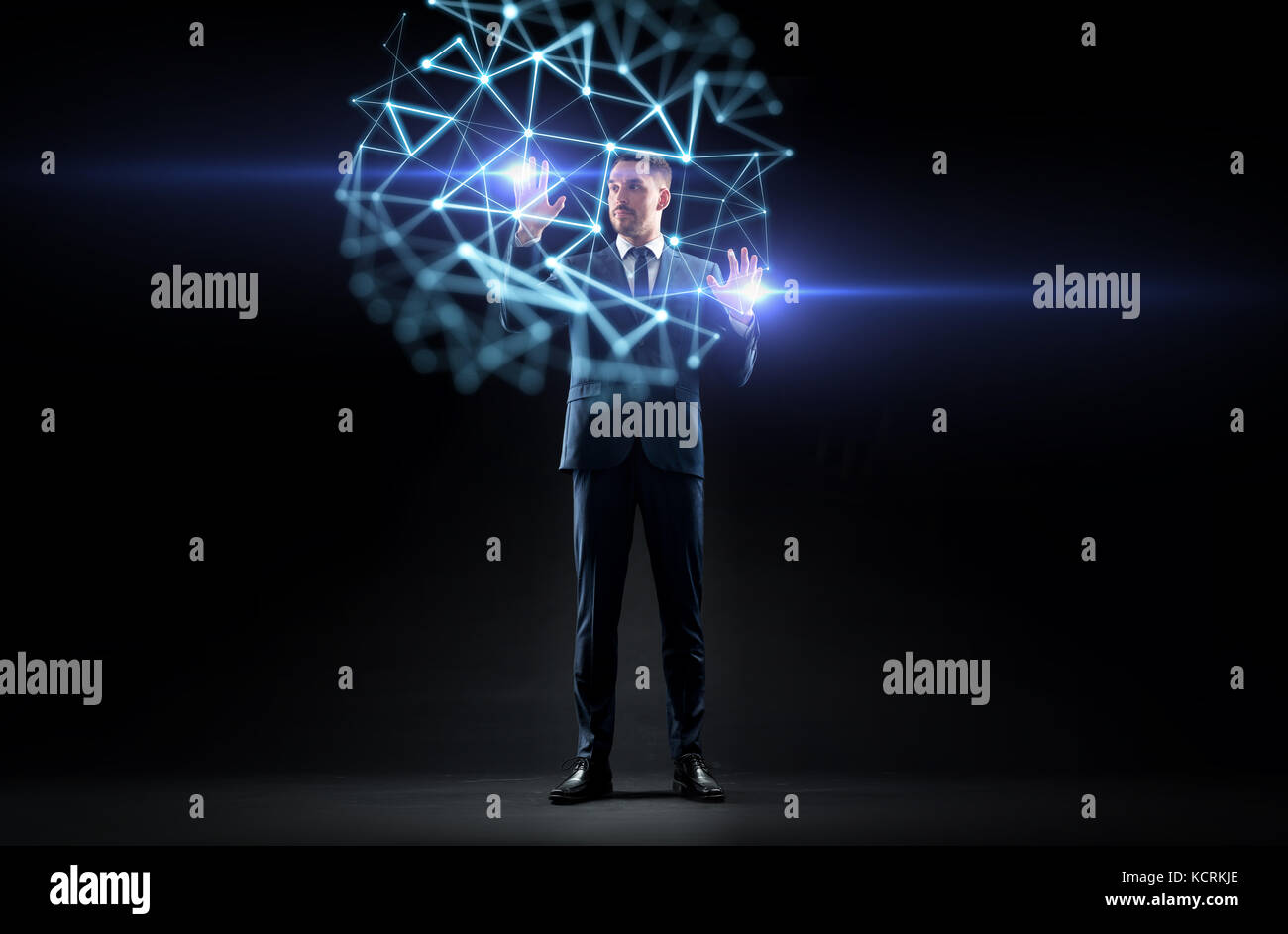 businessman with virtual low poly projection Stock Photo - Alamy