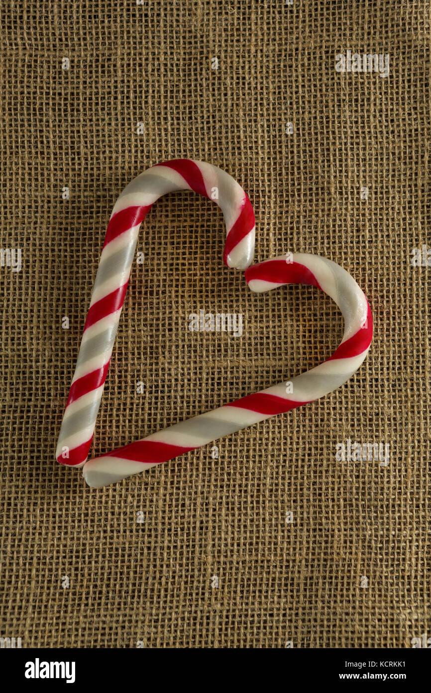 Close-up of heart shaped candy cane on on fabric Stock Photo - Alamy