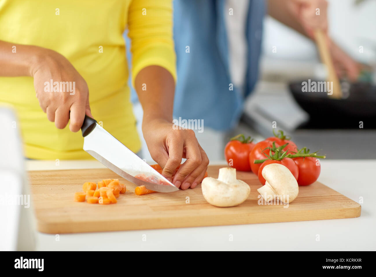 close up of african woman hands cooking food Stock Photo - Alamy