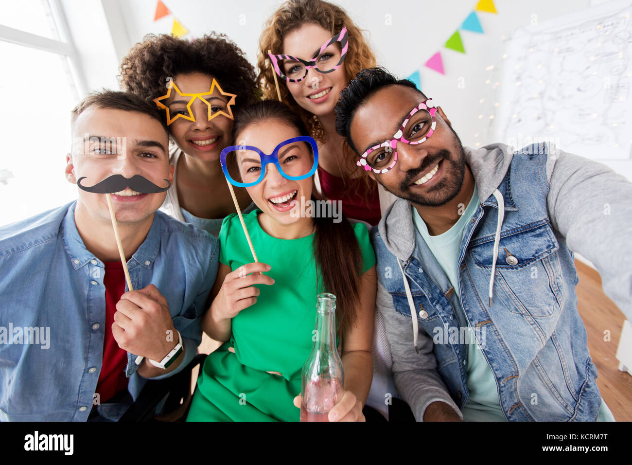 happy friends having fun at home party Stock Photo - Alamy
