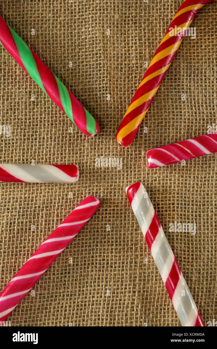 Close-up of multicolored candy canes arranged on fabric Stock Photo - Alamy