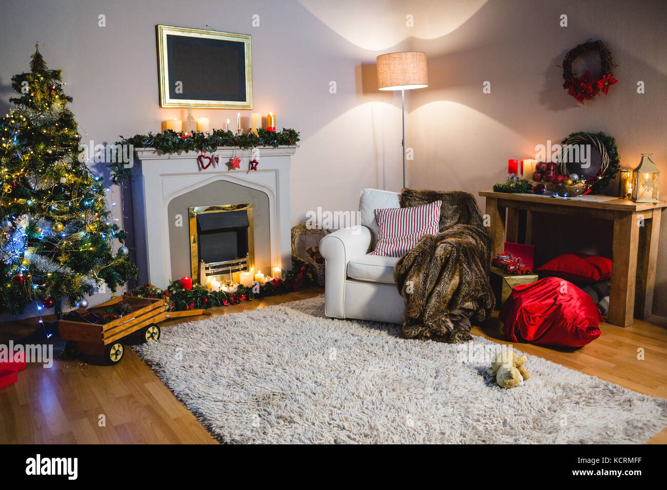 Empty living room with christmas tree, couch and christmas bag Stock ...
