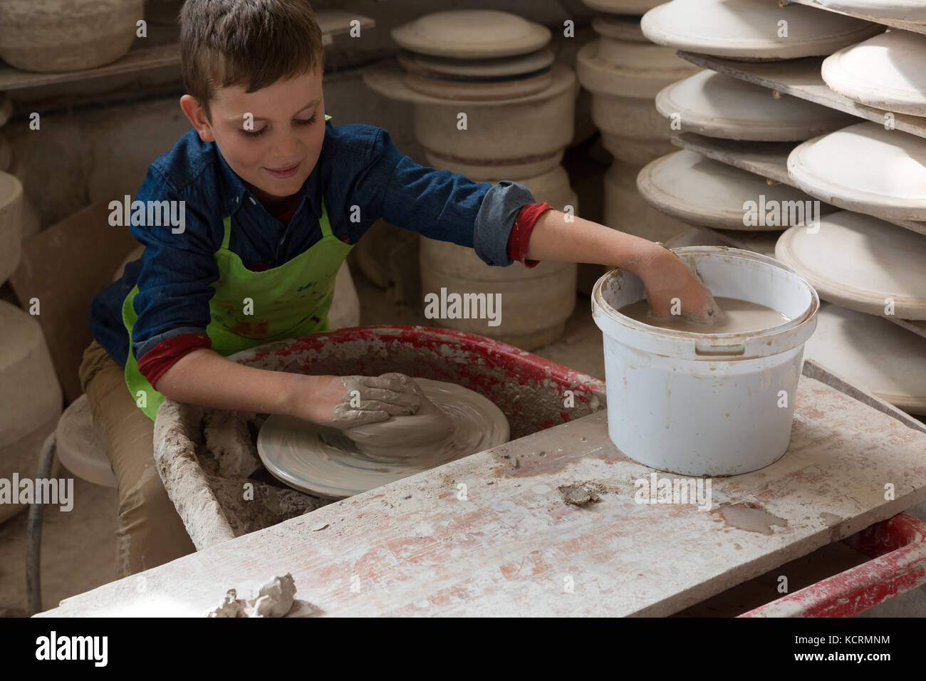 Boy pottery wheel hi-res stock photography and images - Alamy