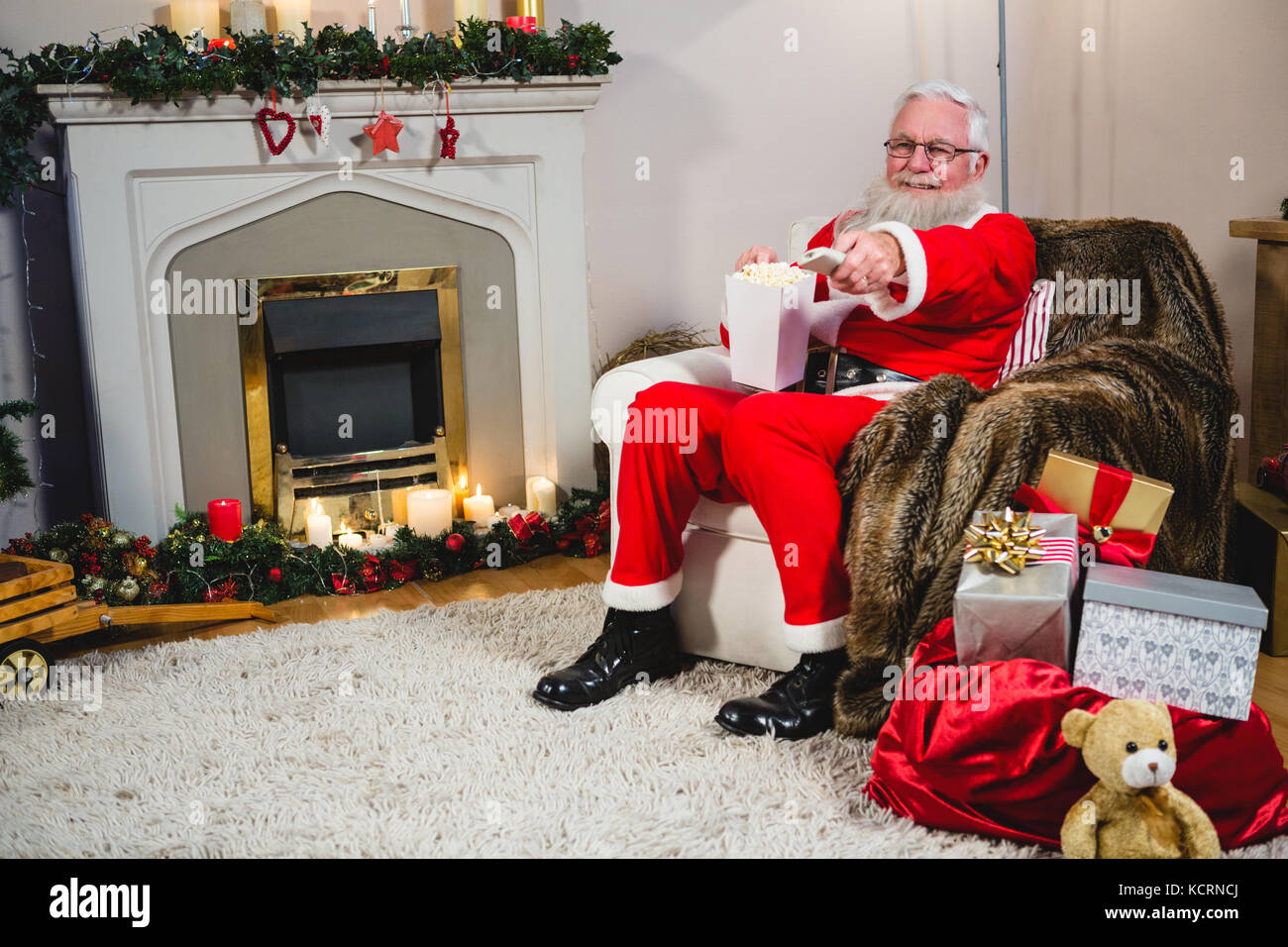 Santa watching tv hi-res stock photography and images - Alamy