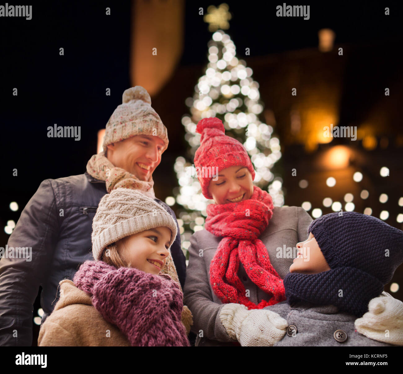 happy family outdoors at christmas eve Stock Photo - Alamy