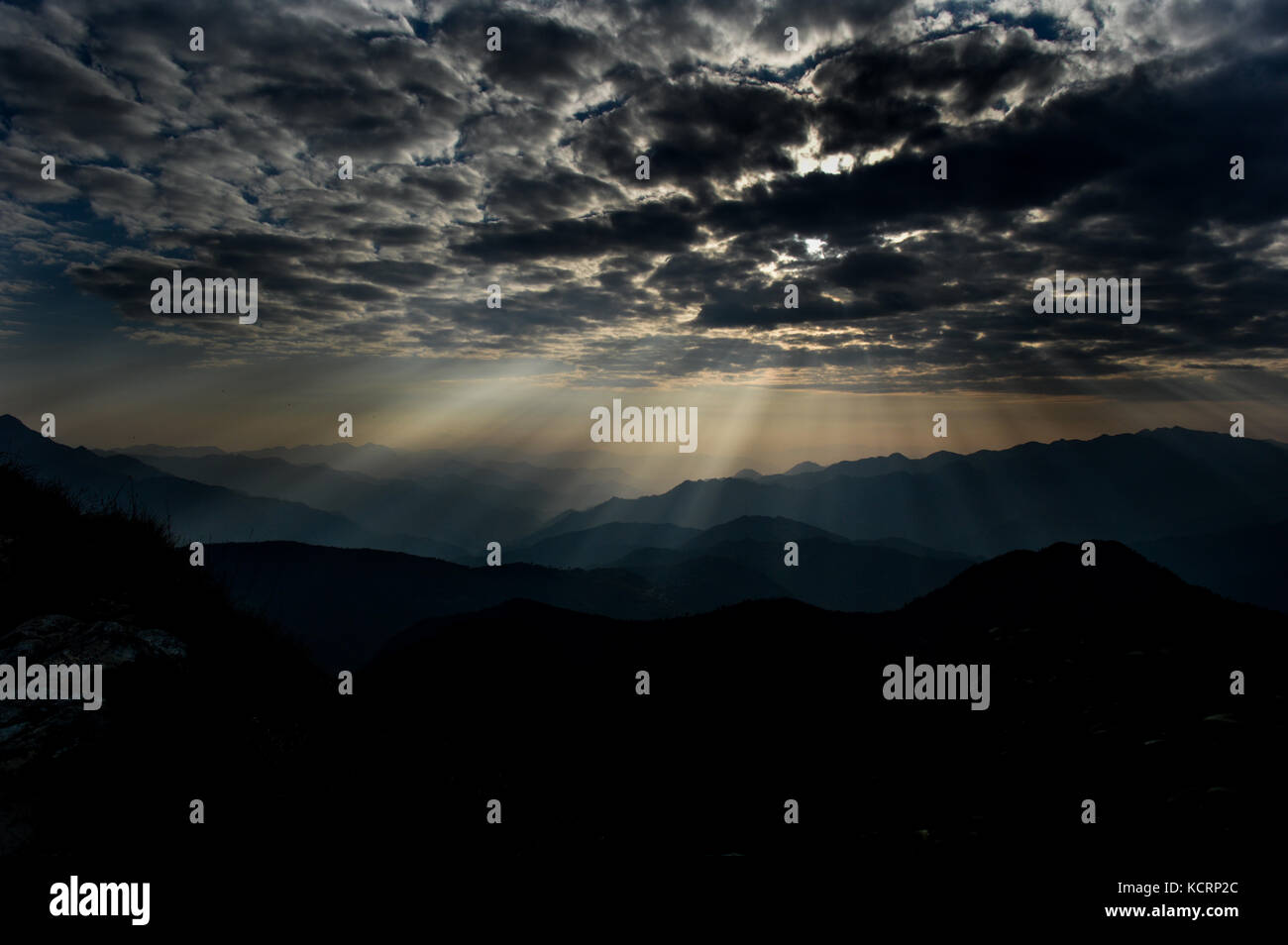 Sun set clouds over mountains hi-res stock photography and images - Alamy
