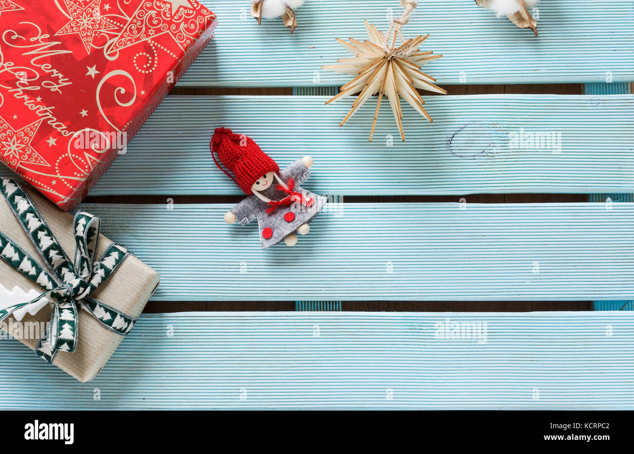 Seasonal rustic Christmas border composed of decorative gifts, pine ...