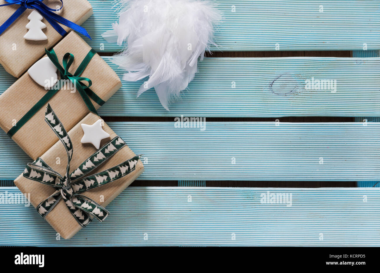 Seasonal rustic Christmas border composed of decorative gifts, pine ...