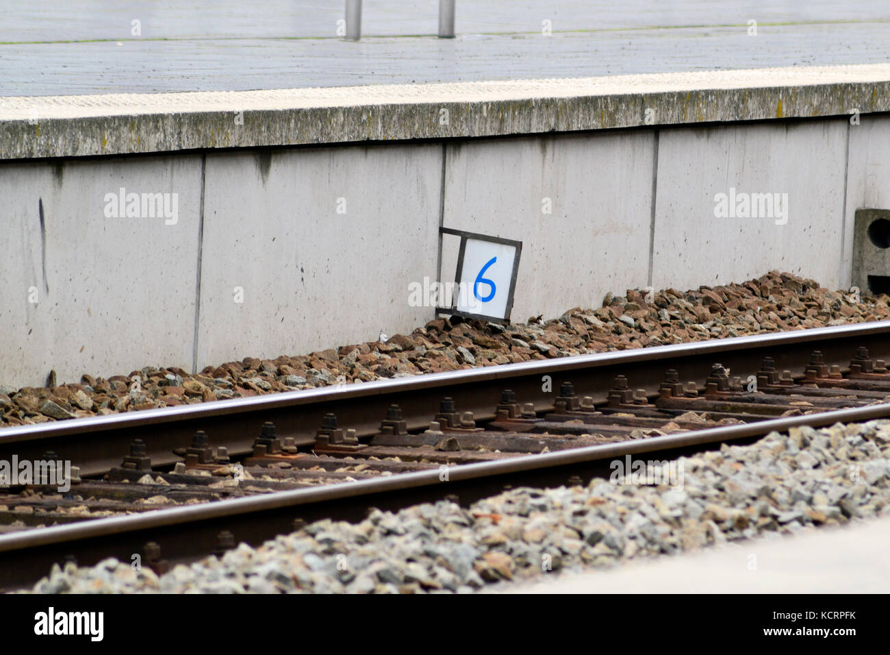 Rails in a train station Stock Photo - Alamy