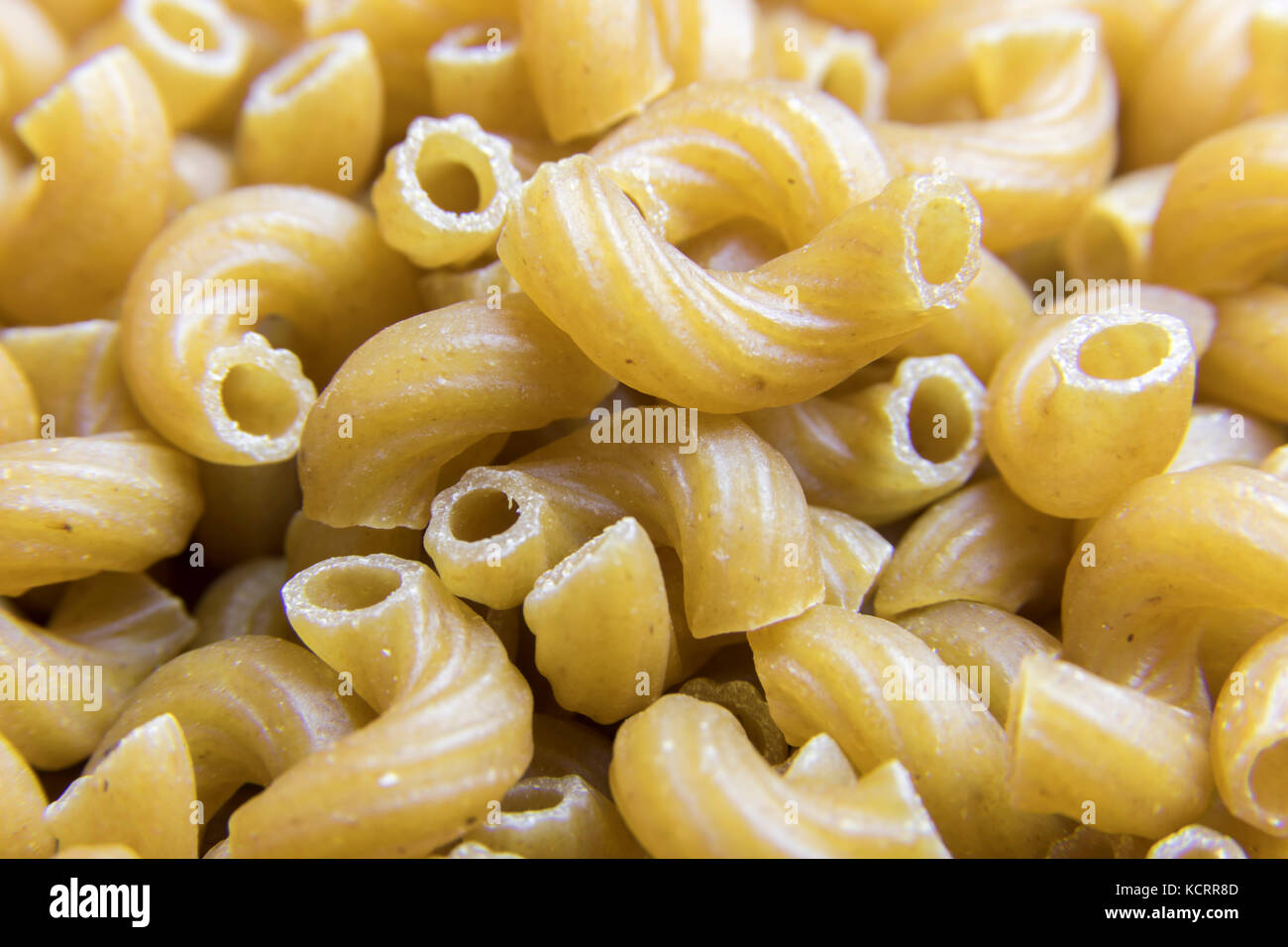 Close up of dry uncooked whole wheat elbow macaroni pasta Stock Photo ...