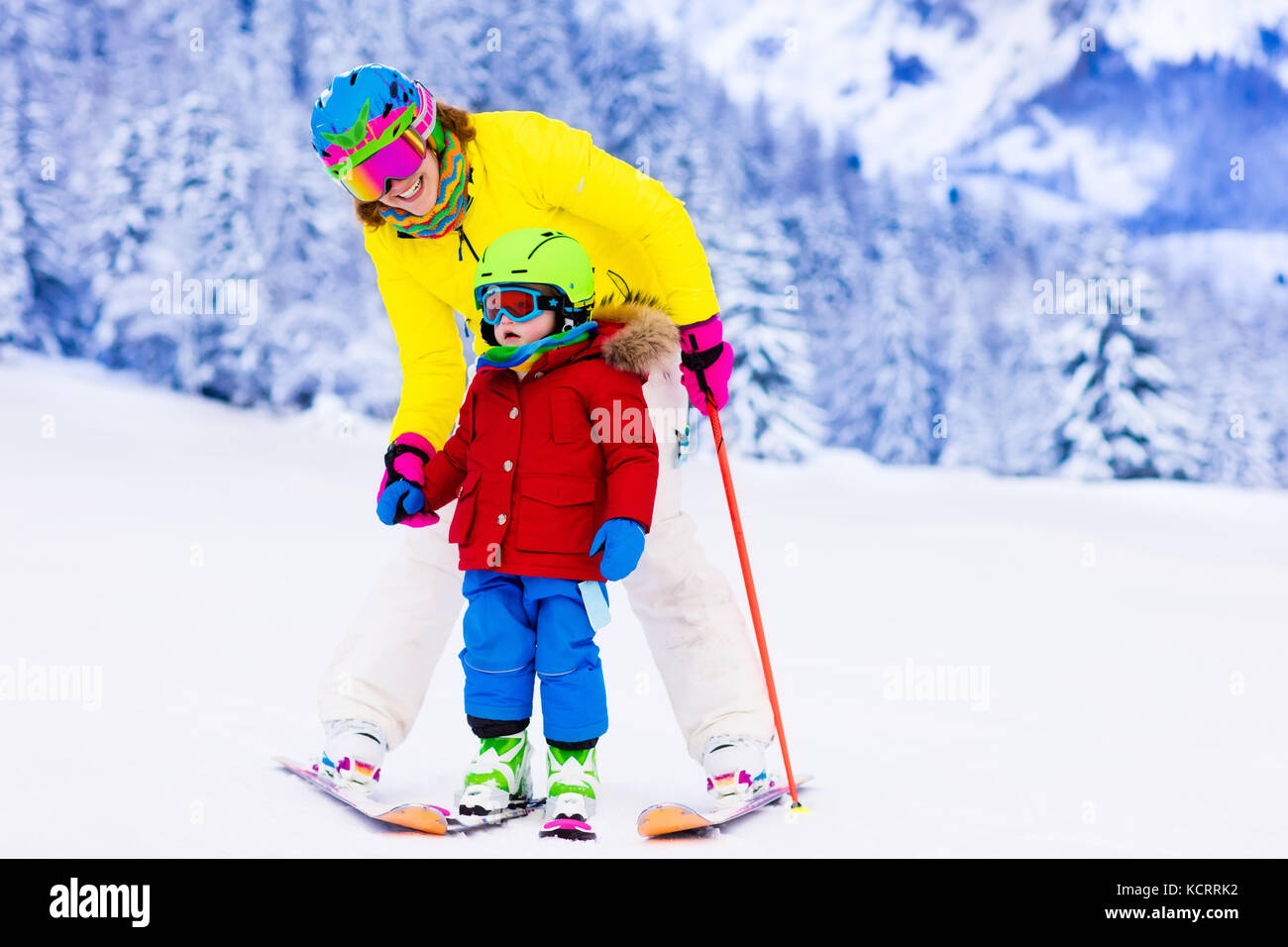 Family ski vacation. Group of skiers in Swiss Alps mountains. Mother ...