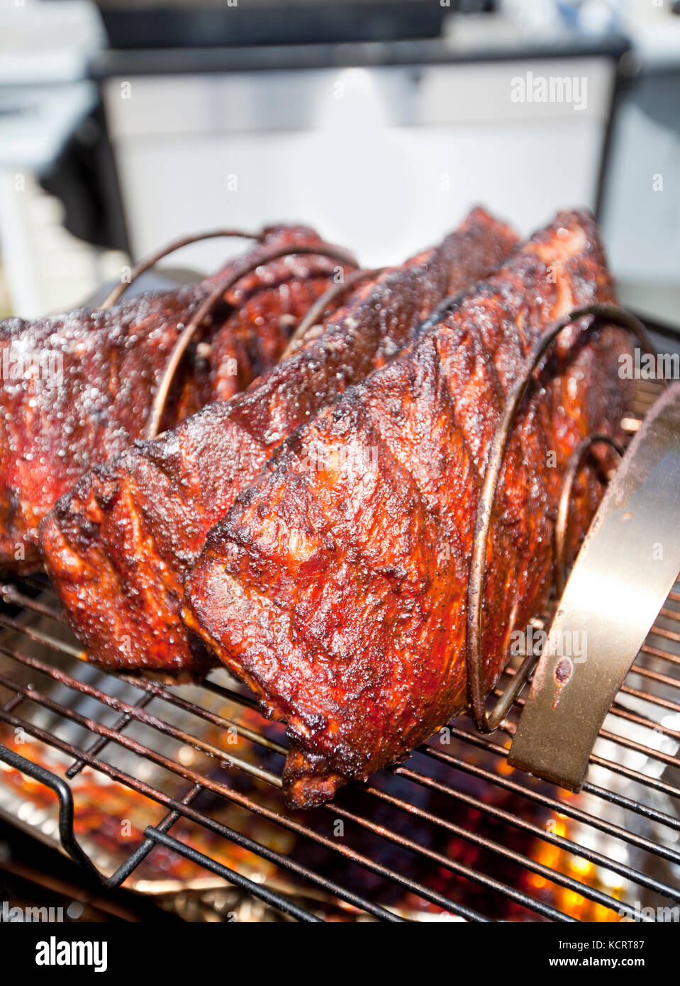 BBQ pork ribs cooking on a smoker Stock Photo - Alamy