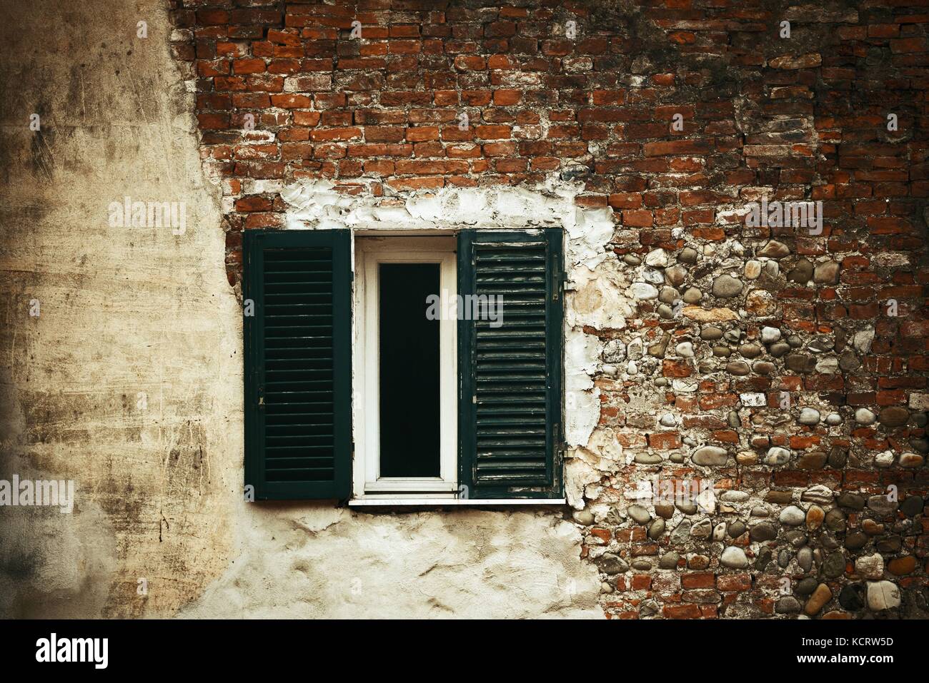 Vintage window with brick texture closeup in medieval Town Lucca in ...
