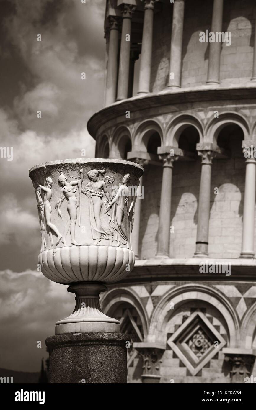Leaning tower closeup view with sculpture in Pisa, Italy as the ...