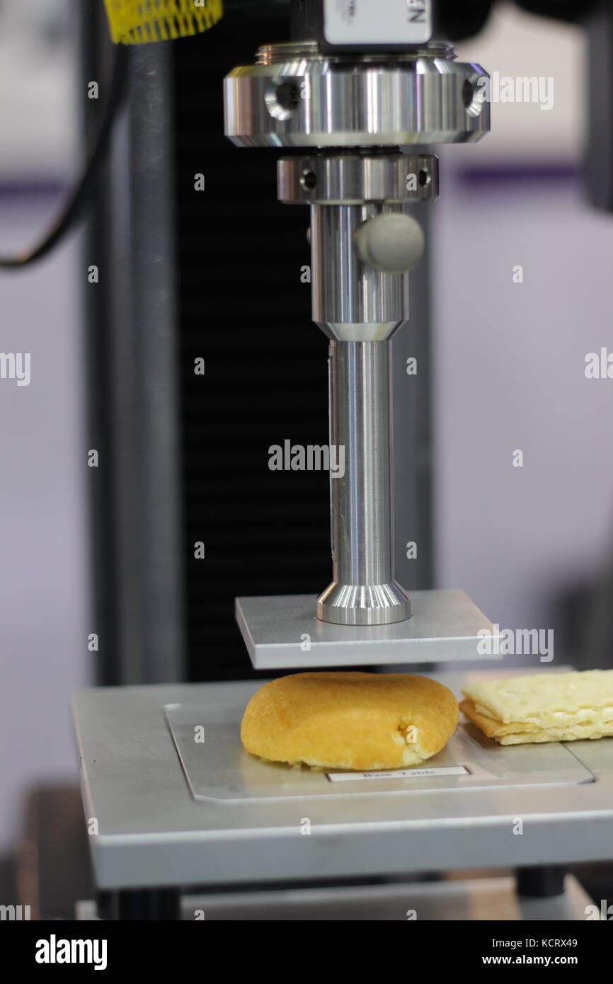 Compressive testing machine ; To test biscuit Stock Photo - Alamy