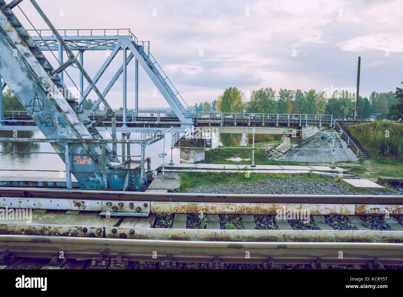 Jugla lake in Riga, autumn, Railway bridge. 2017 Stock Photo - Alamy