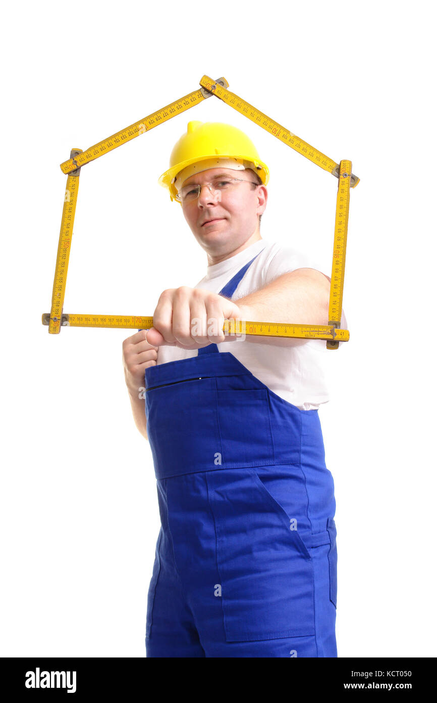 Engineer in white helmet holding measuring scale hi-res stock ...
