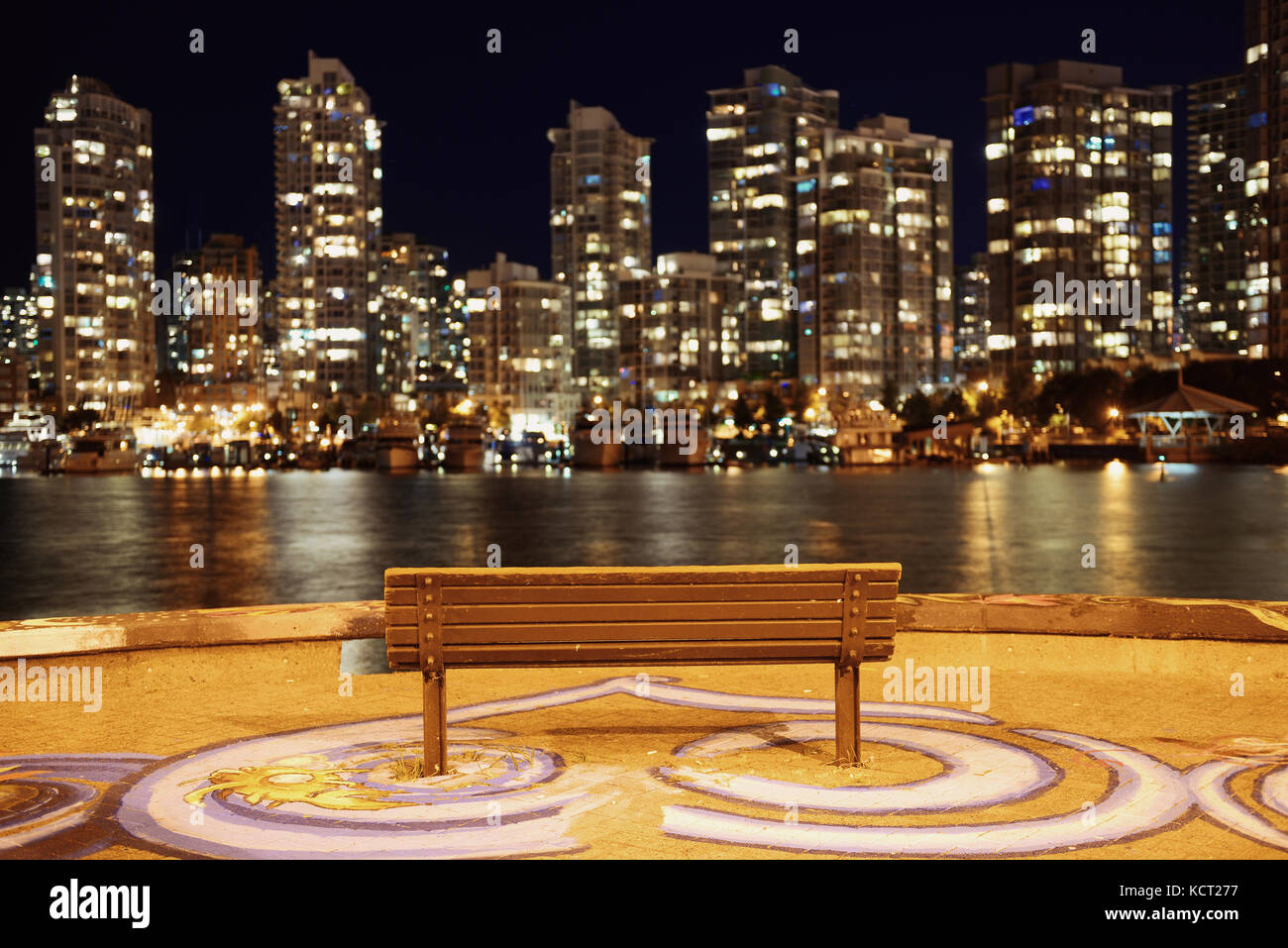 Vancouver city night with bench at waterfront with buildings Stock ...