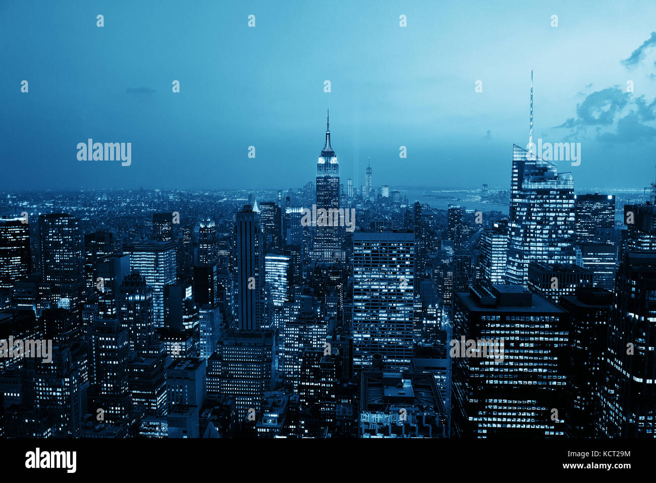 New York City night rooftop view with urban architectures Stock Photo ...