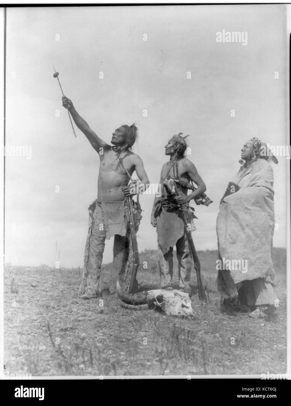 Crow Indians offering food Edward S. Curtis Stock Photo - Alamy