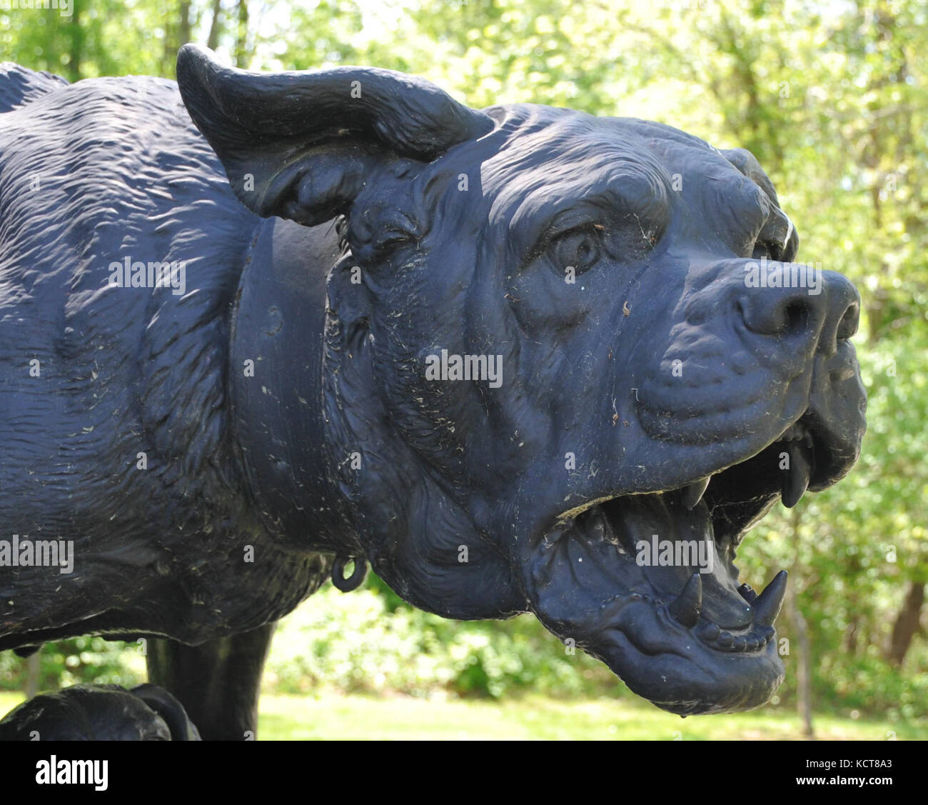 A Bull Mastiff statue located in the gardens of Nemours Mansion in ...