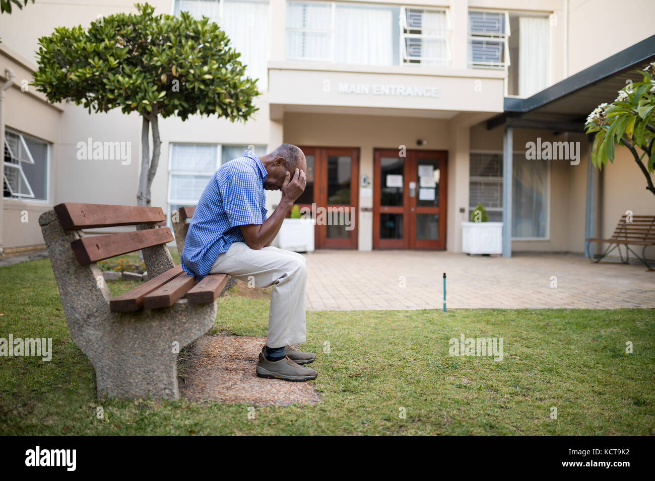 Side view of depressed senior man sitting on bench Stock Photo - Alamy Side view of depressed senior man sitting on bench Stock Photo - Alamy