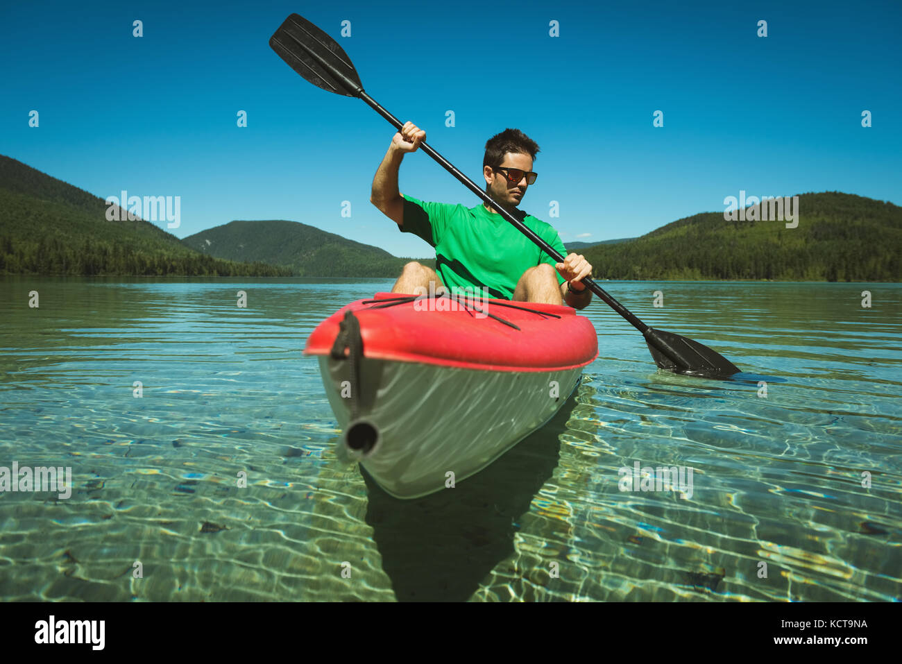 Man kayaking in mountain river hi-res stock photography and images - Alamy