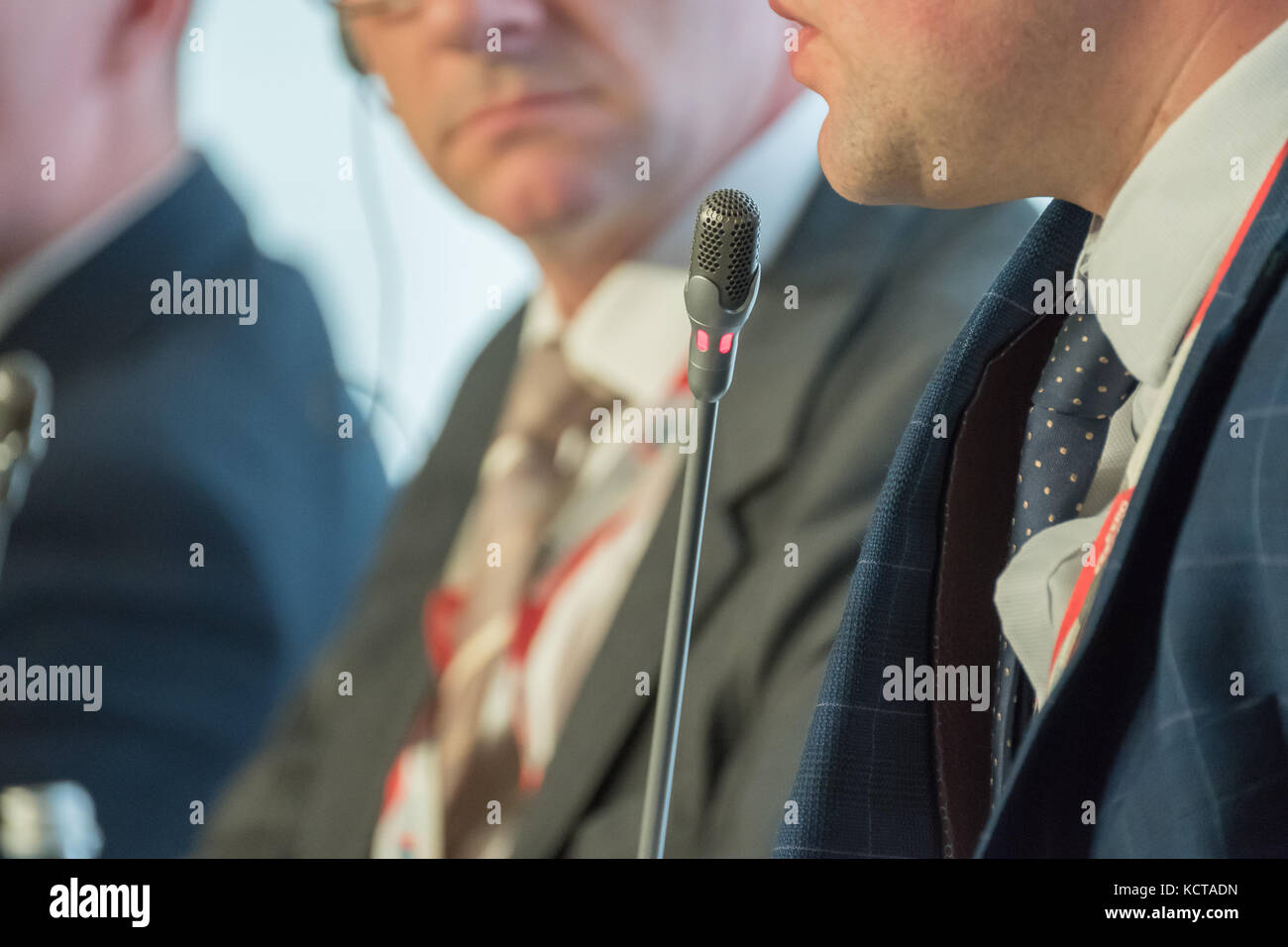 Man speaking at the conference Stock Photo - Alamy