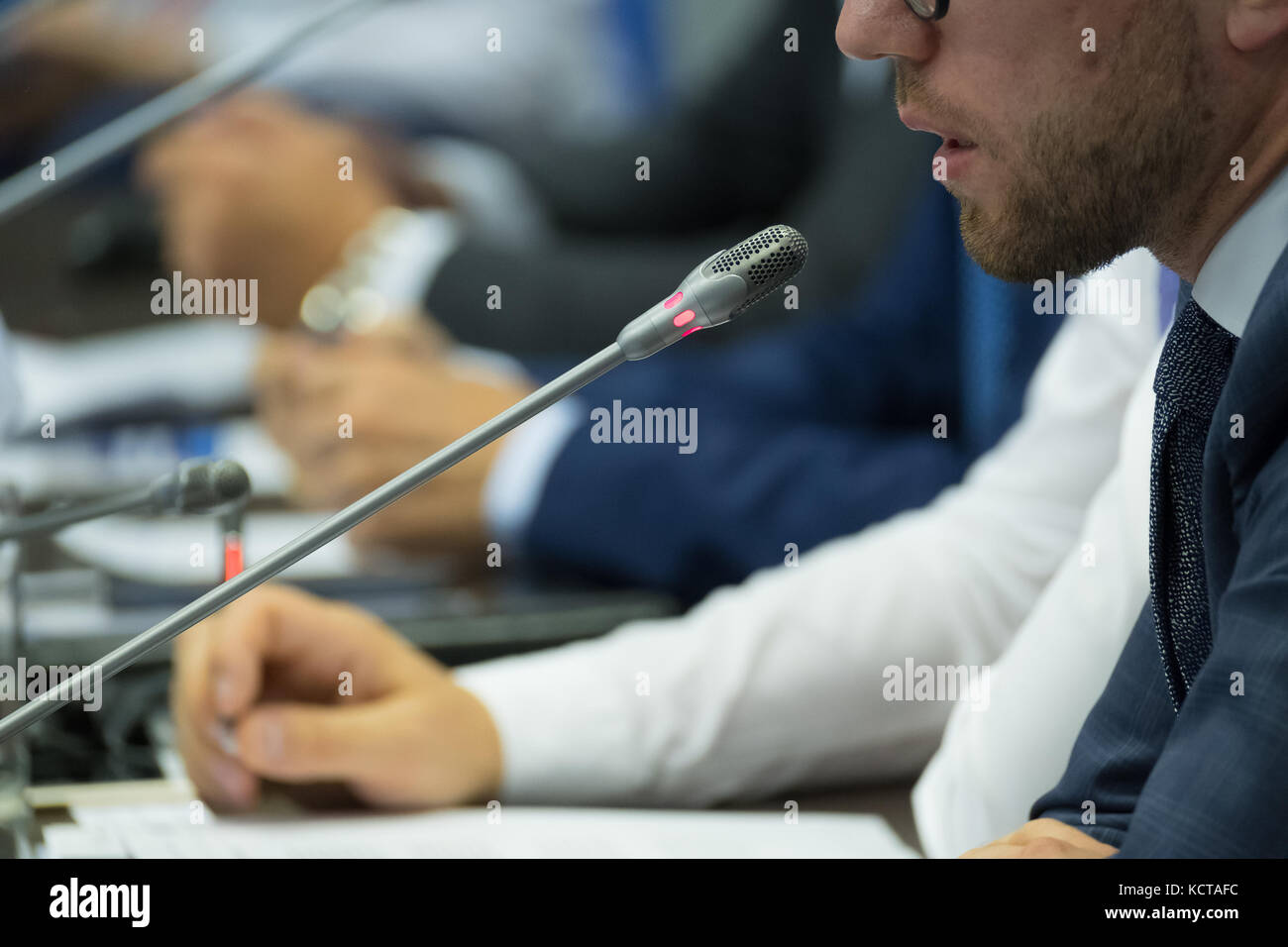 Man speaking at the conference Stock Photo - Alamy