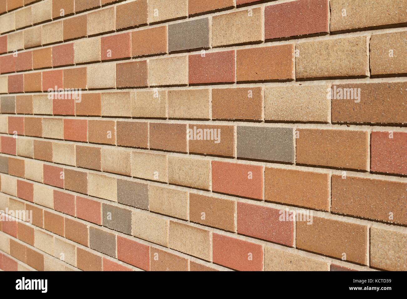 Attractive modern brick wall background with varying shades of light ...