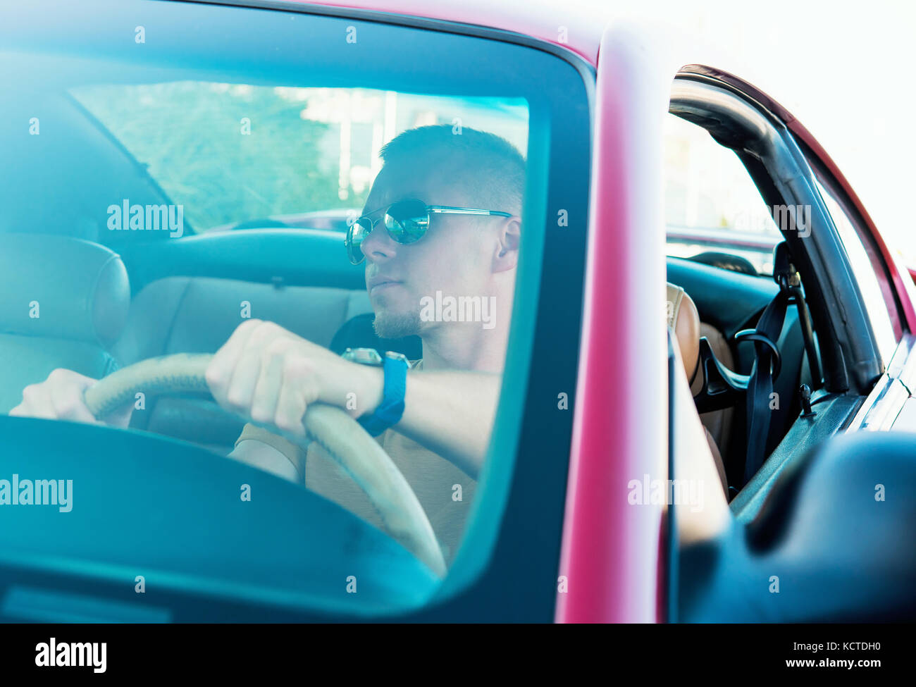 man behind the wheel Stock Photo - Alamy
