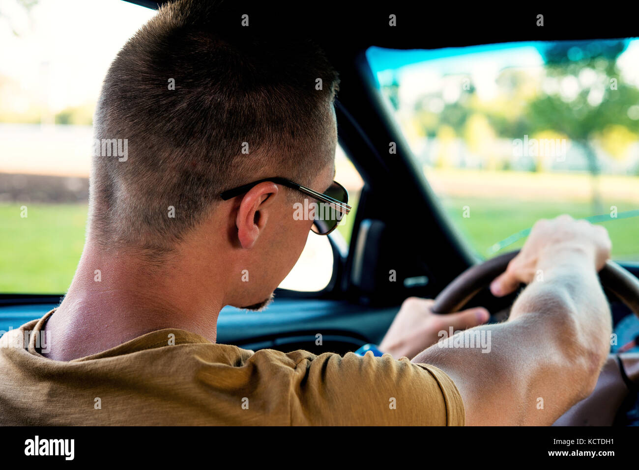 man behind the wheel Stock Photo - Alamy