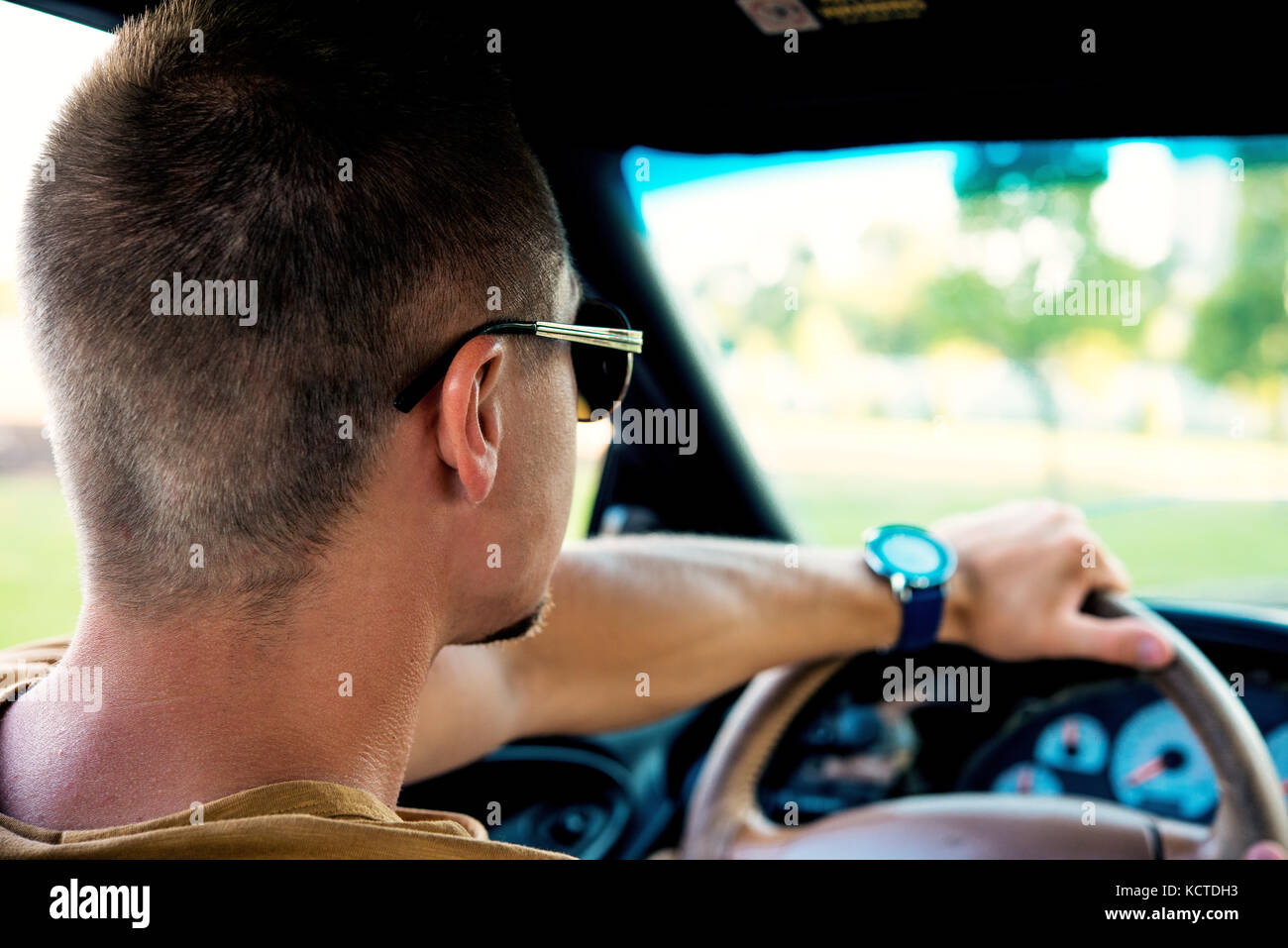 man behind the wheel Stock Photo - Alamy