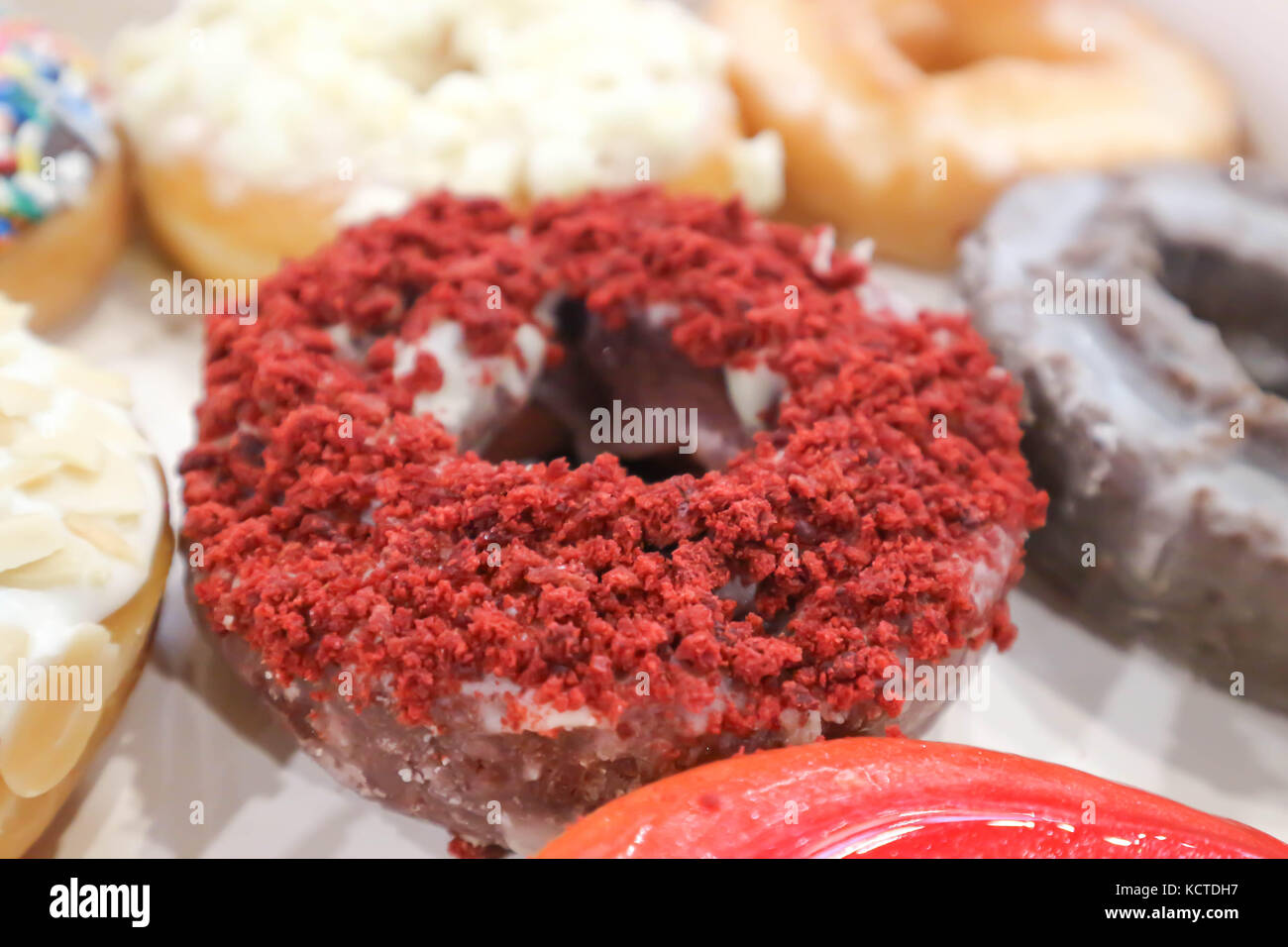 Red velvet donut hi-res stock photography and images - Alamy
