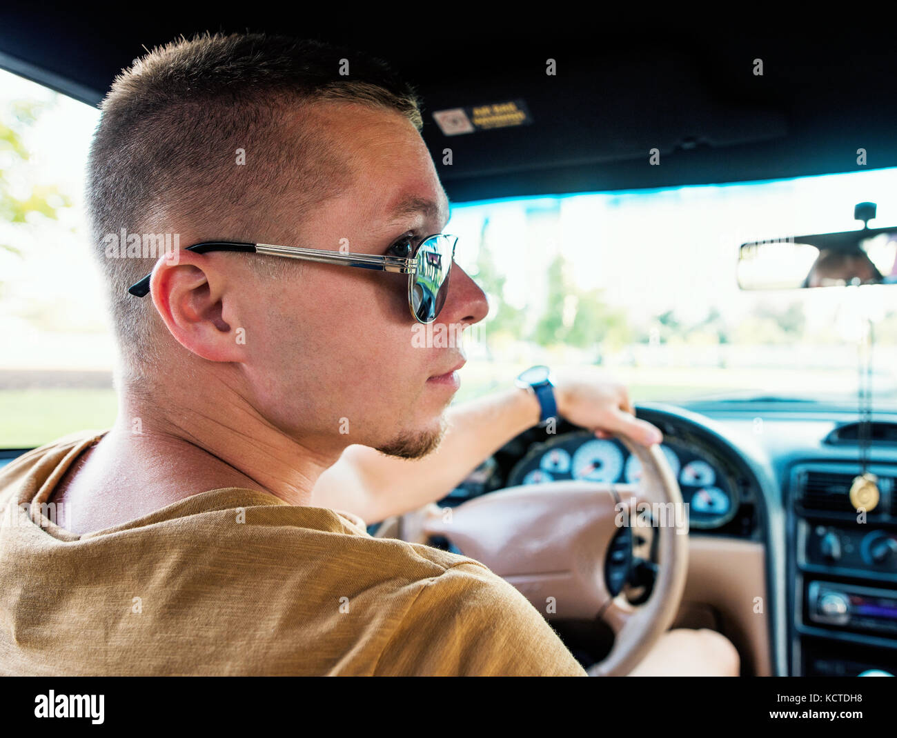 man behind the wheel Stock Photo - Alamy