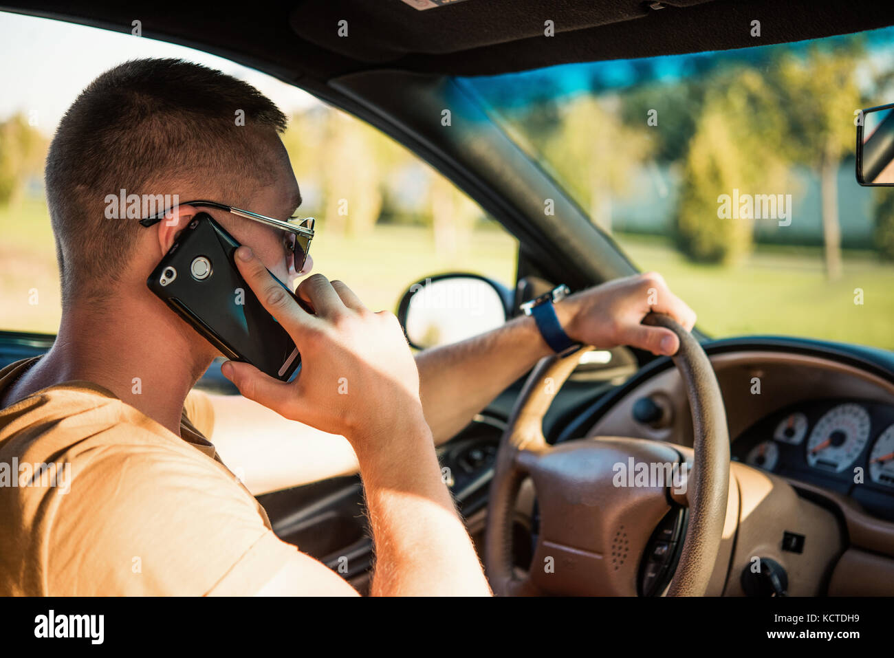 man behind the wheel Stock Photo - Alamy