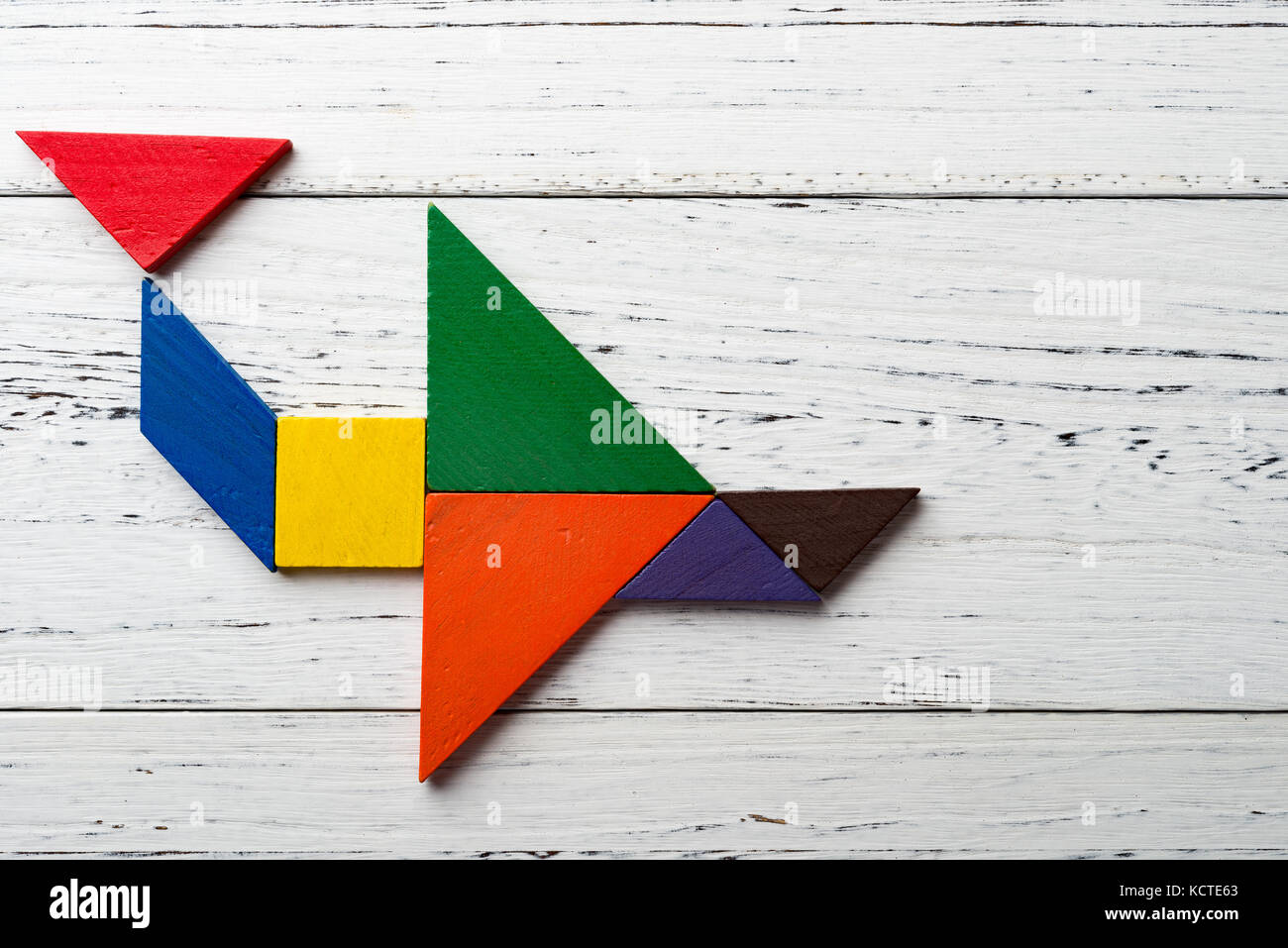 wooden tangram in an airplane shape Stock Photo - Alamy