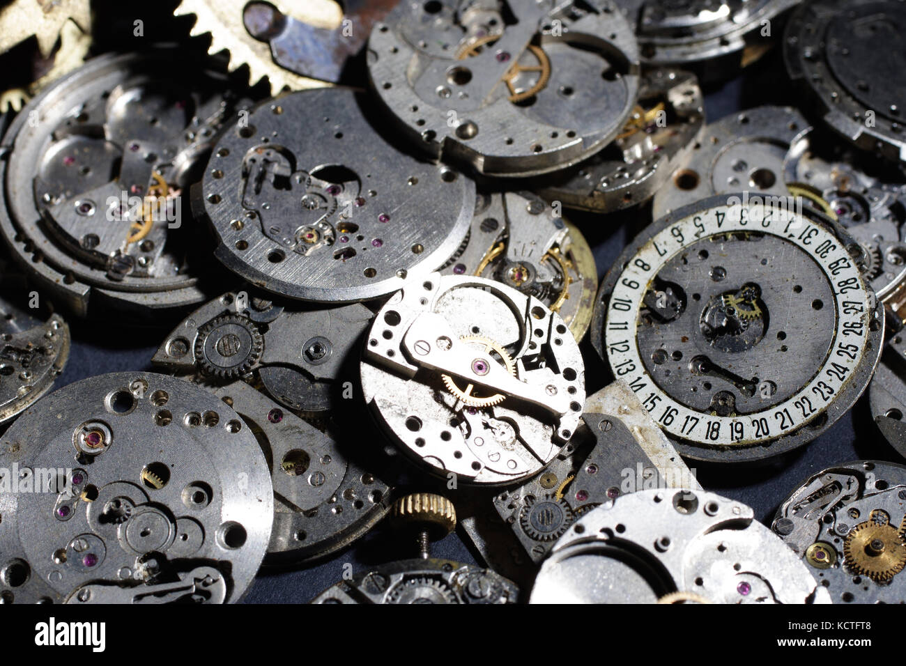 broken mechanical watches background Stock Photo - Alamy