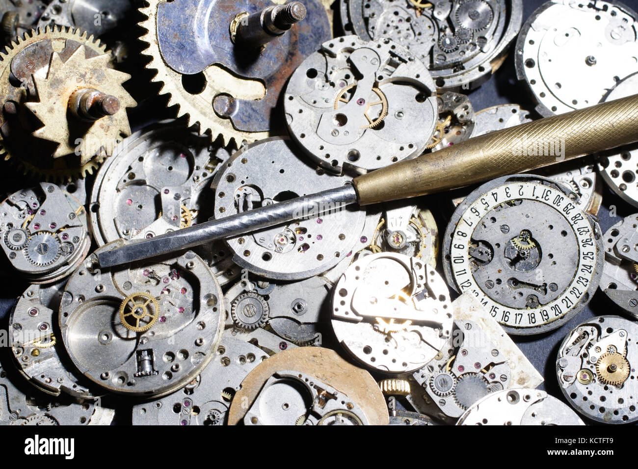 broken mechanical watches background Stock Photo - Alamy